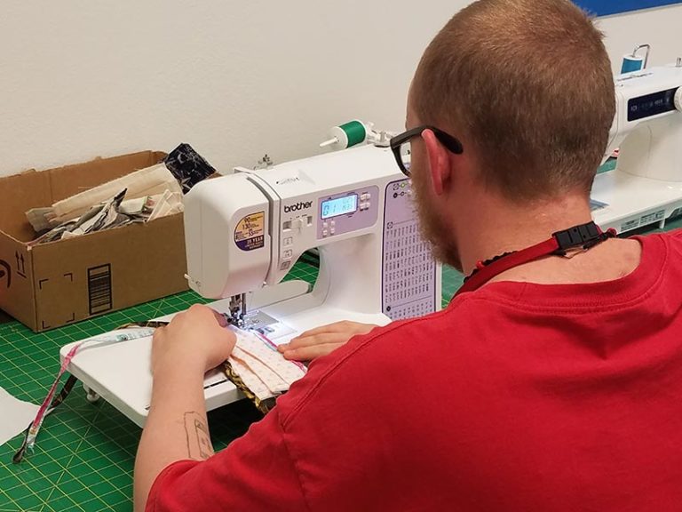 Casper Reentry residents helps make masks for youth centers - GEO